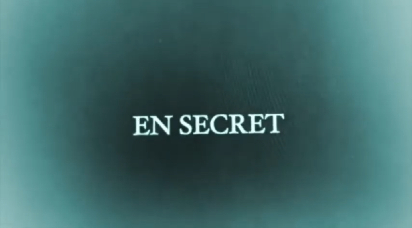 En secret